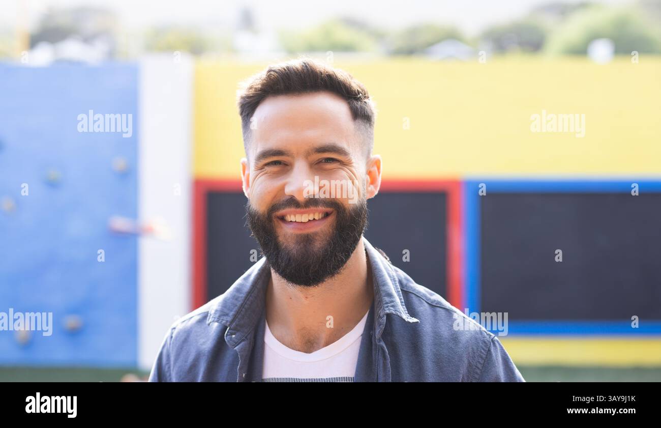 Teenage man standing playground hi-res stock photography and images - Alamy