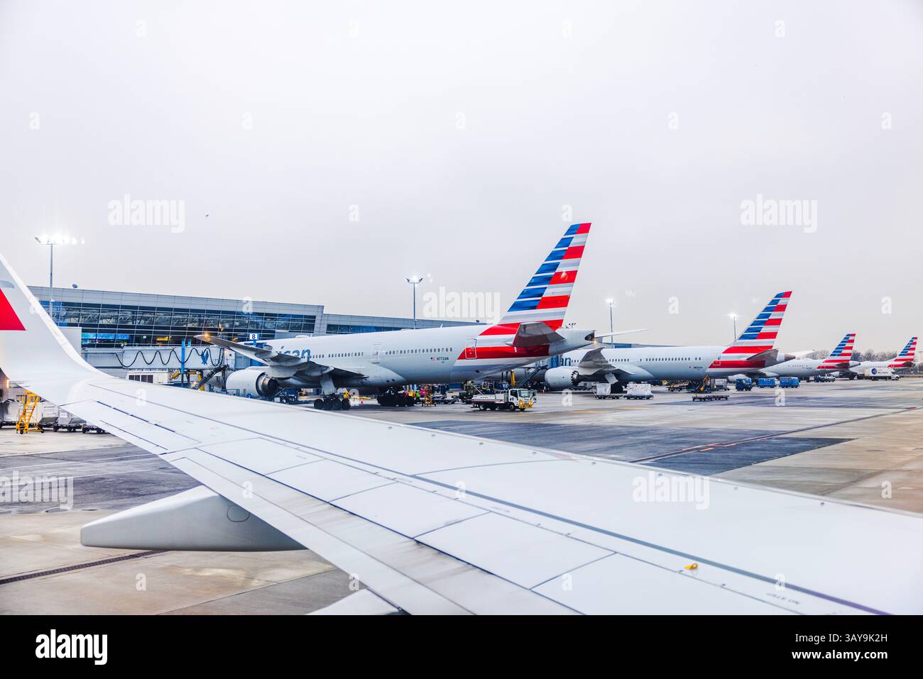 American Airlines aircraft parked at terminal gates in JFK airport ...