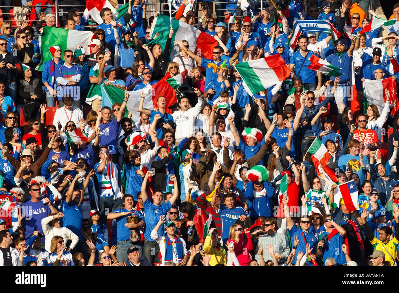Spectators cheer before the start of a FIFA World Cup Group F soccer ...
