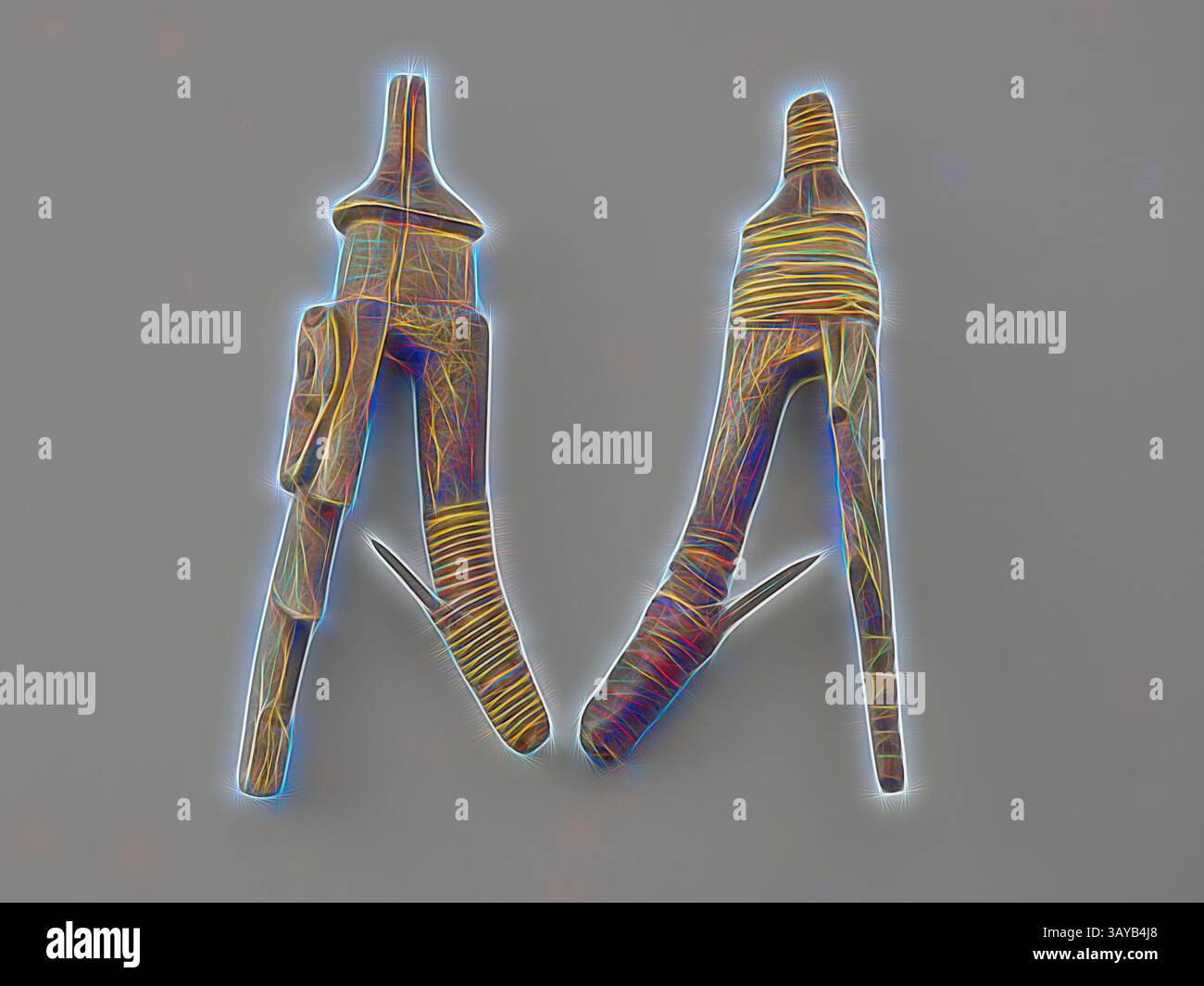 Two intricately designed tools resembling compasses, featuring detailed ...