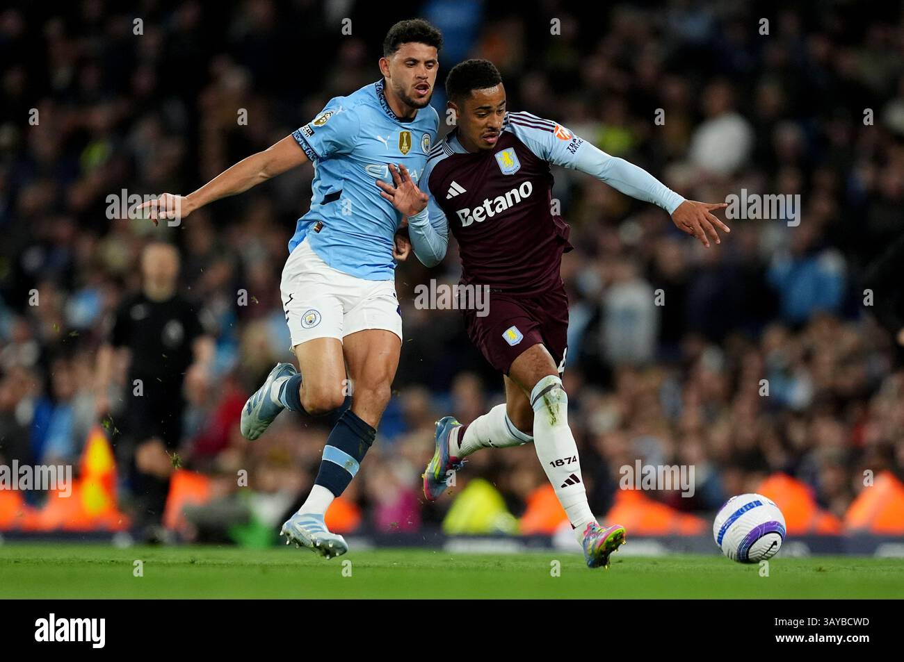 Manchester City's Matheus Nunes (left) and Aston Villa's Jacob Ramsey ...