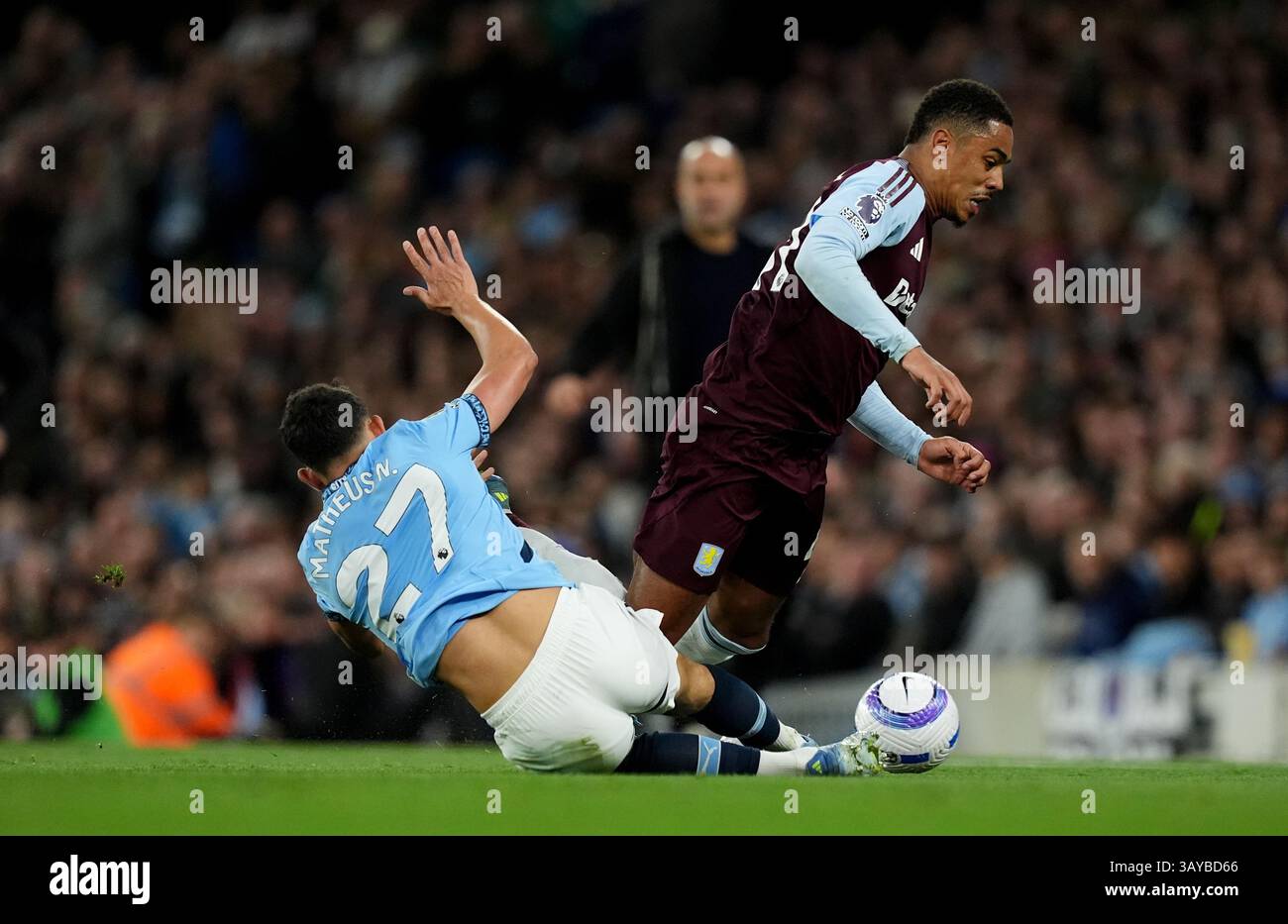 Manchester City's Matheus Nunes (left) and Aston Villa's Jacob Ramsey ...