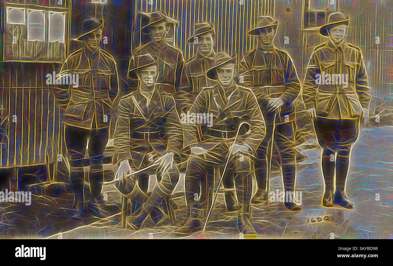 A group of eight soldiers, some seated and others standing, dressed in ...