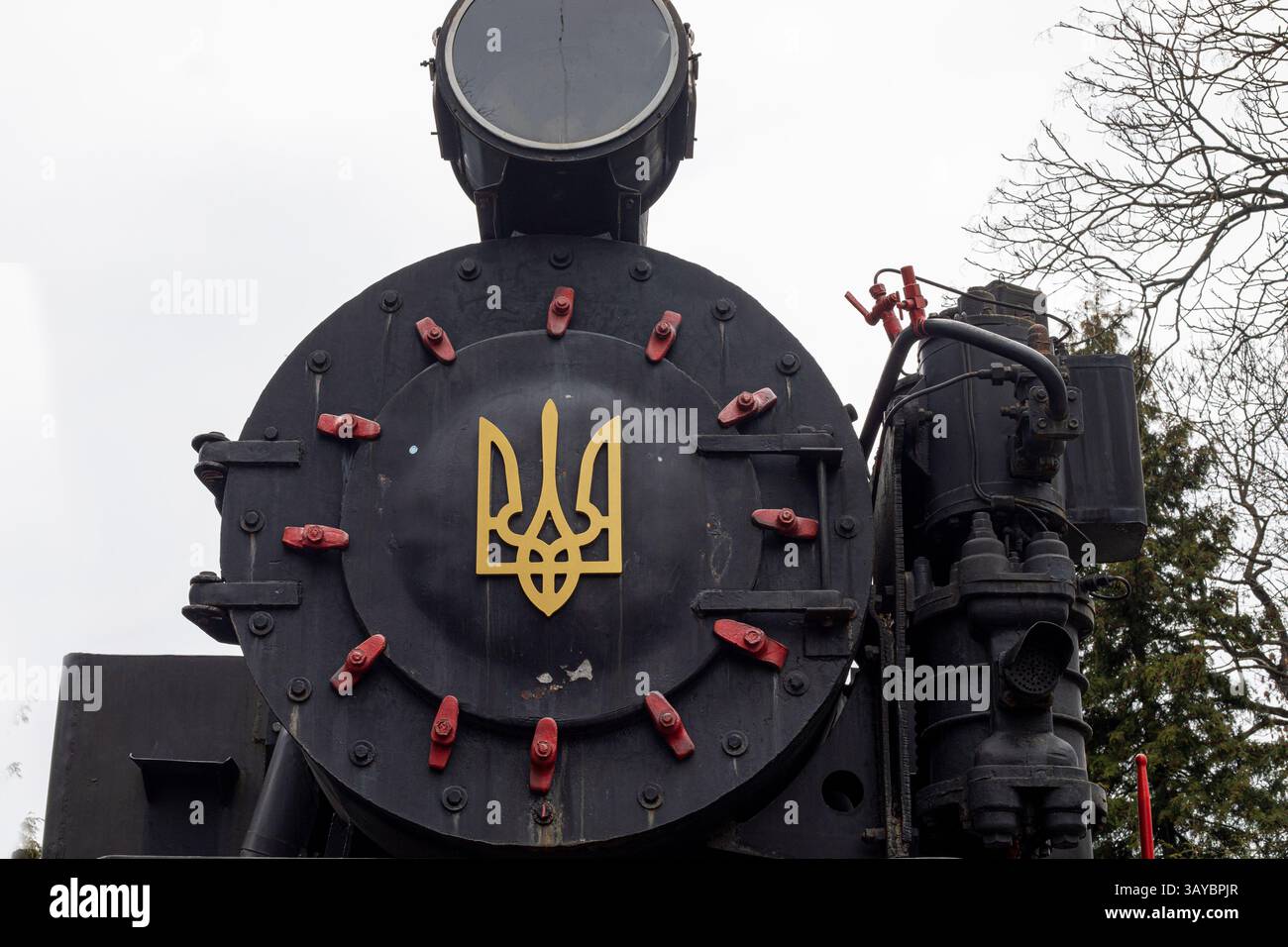 sign and symbol golden trident on the locomotive outside. Confrontation ...