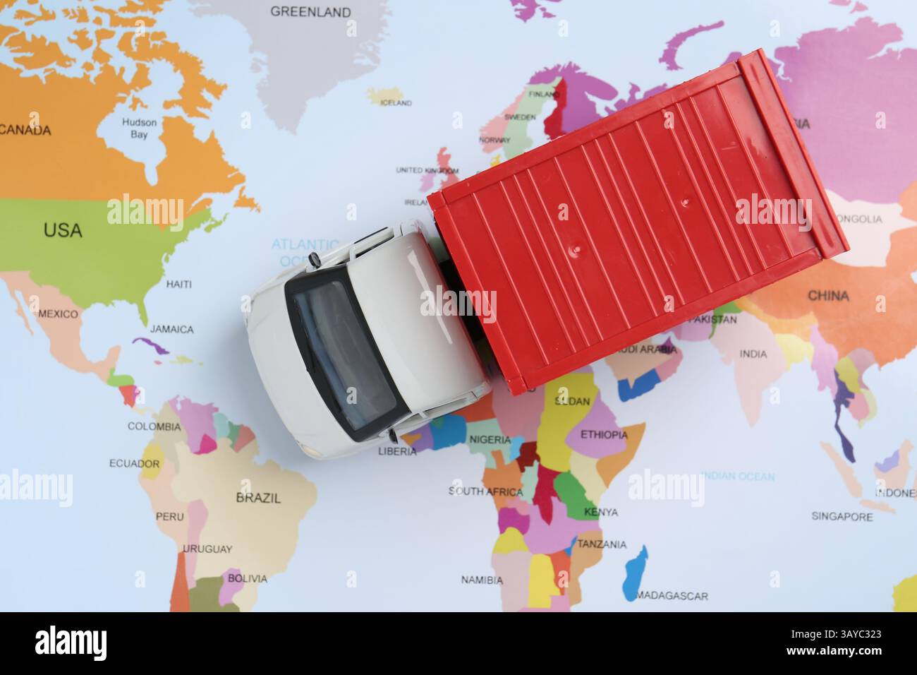 Truck model on world map, top view Stock Photo - Alamy