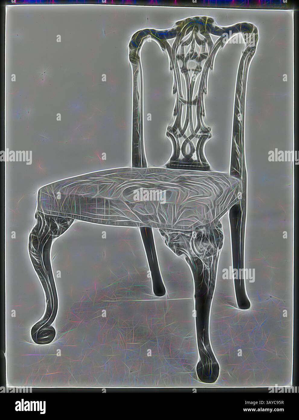 An intricately designed chair featuring curvaceous lines and ornate ...