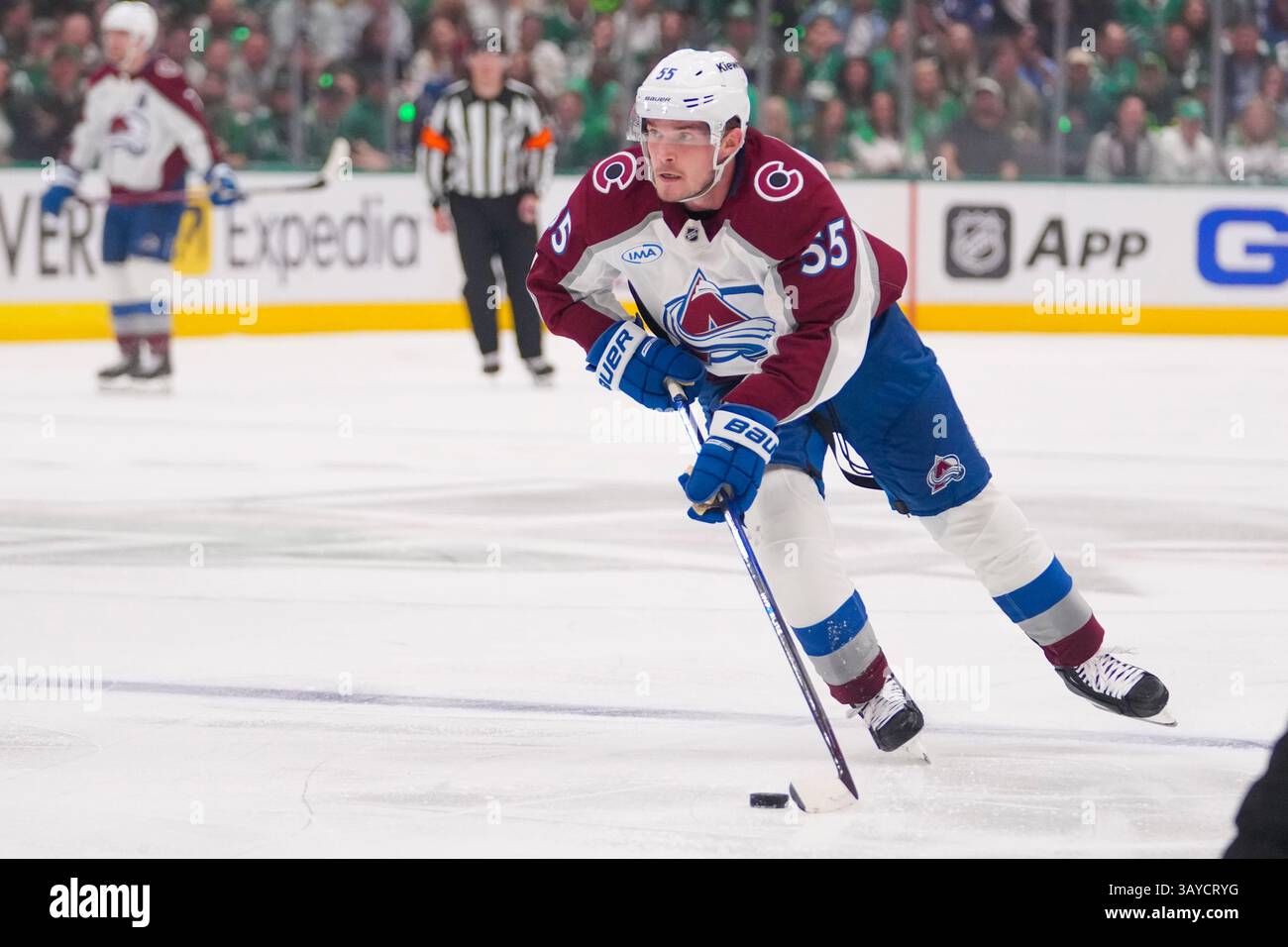 Colorado Avalanche defenseman Ryan Lindgren (55) skates with the puck ...