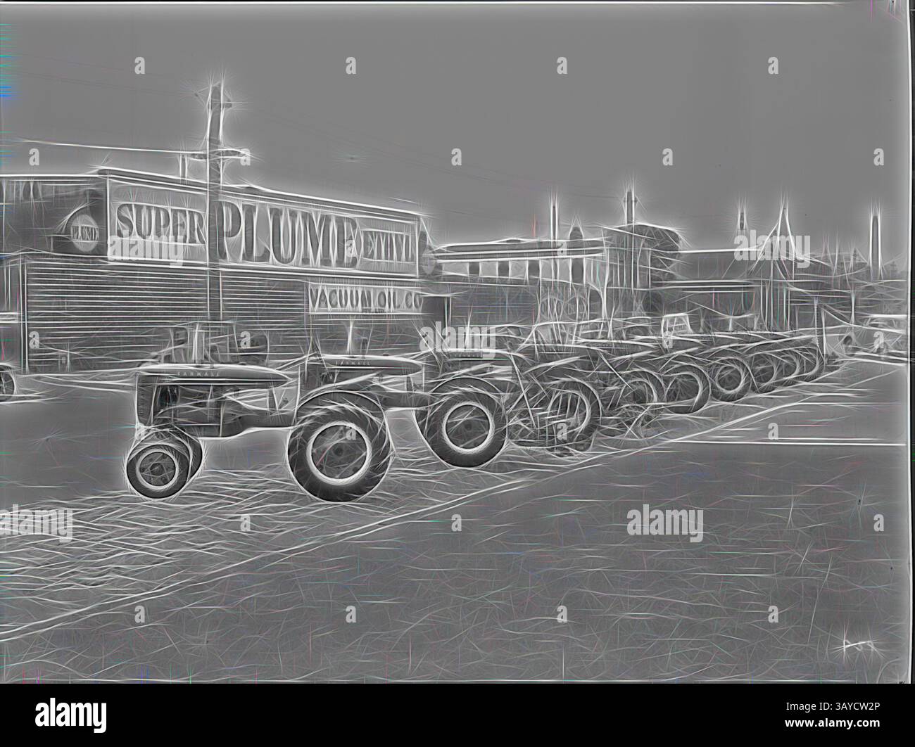 A row of vintage tractors lined up outside a building, showcasing their ...