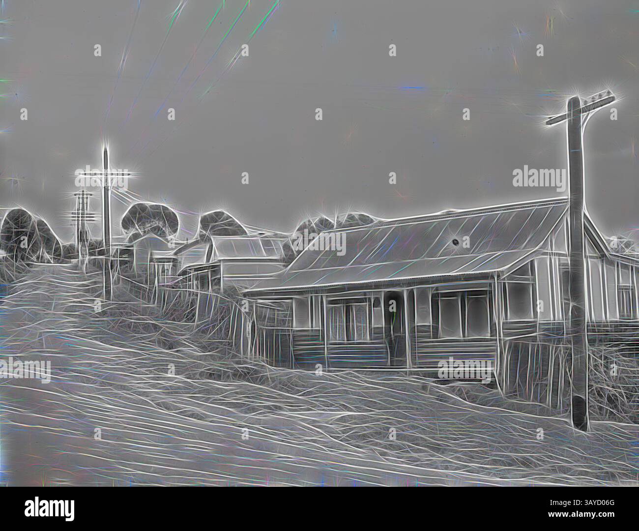 A quiet street scene showcasing simple houses lined along a hillside ...