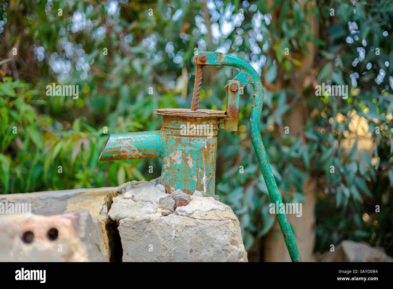 Old Rusty Water Pump in Countryside Garden Stock Photo - Alamy