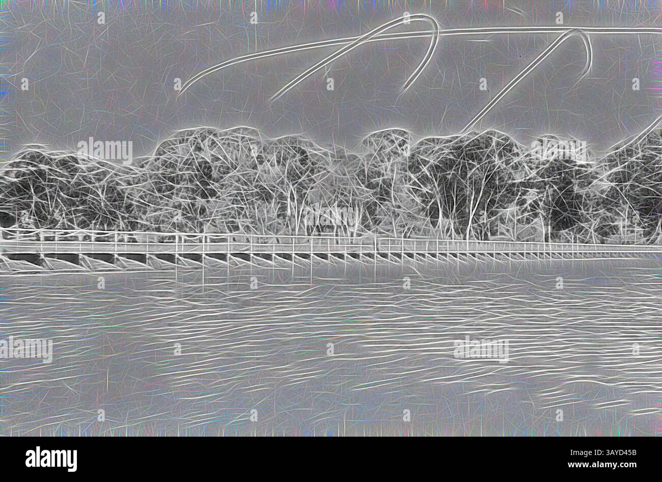 A serene waterway lined with trees, with a wooden walkway extending ...