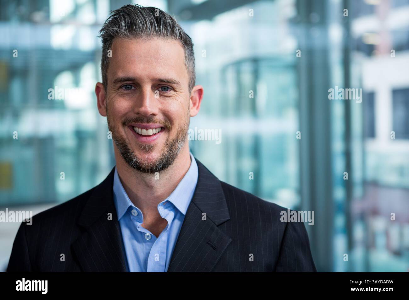 Man in light blue jacket hi-res stock photography and images - Alamy