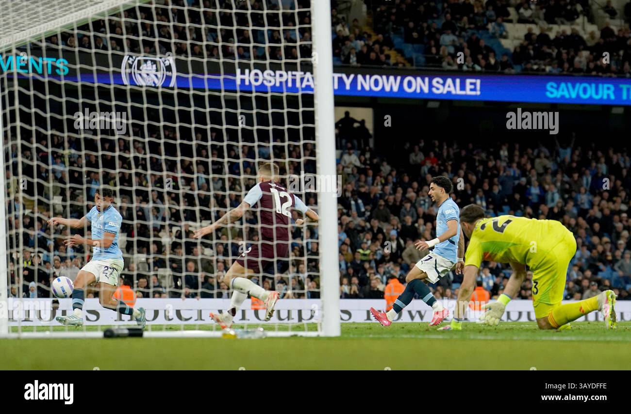 Manchester City's Matheus Nunes scores their side's second goal of the ...