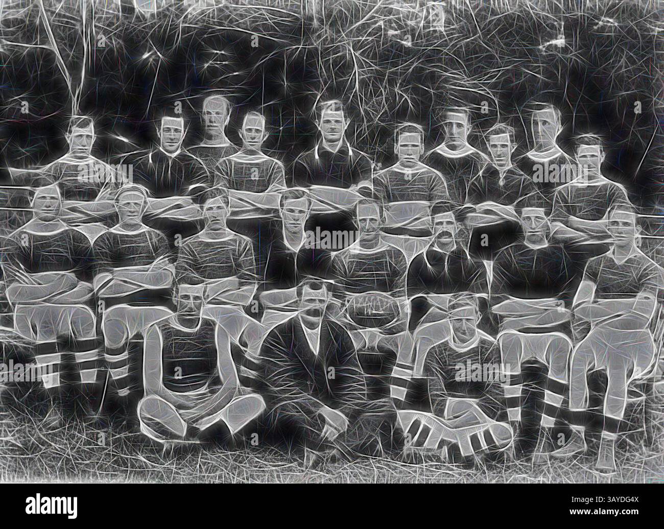 A historic group of men dressed in sports uniforms, posed together in ...