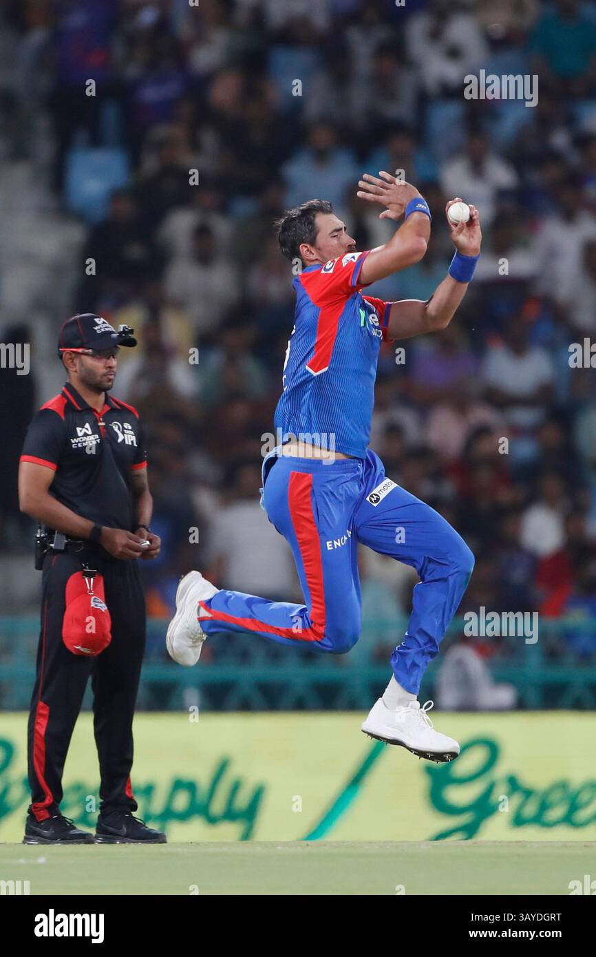LUCKNOW, INDIA - APRIL 22: Mitchell Starc of Delhi Capitals bowls during the 2025 IPL match ...