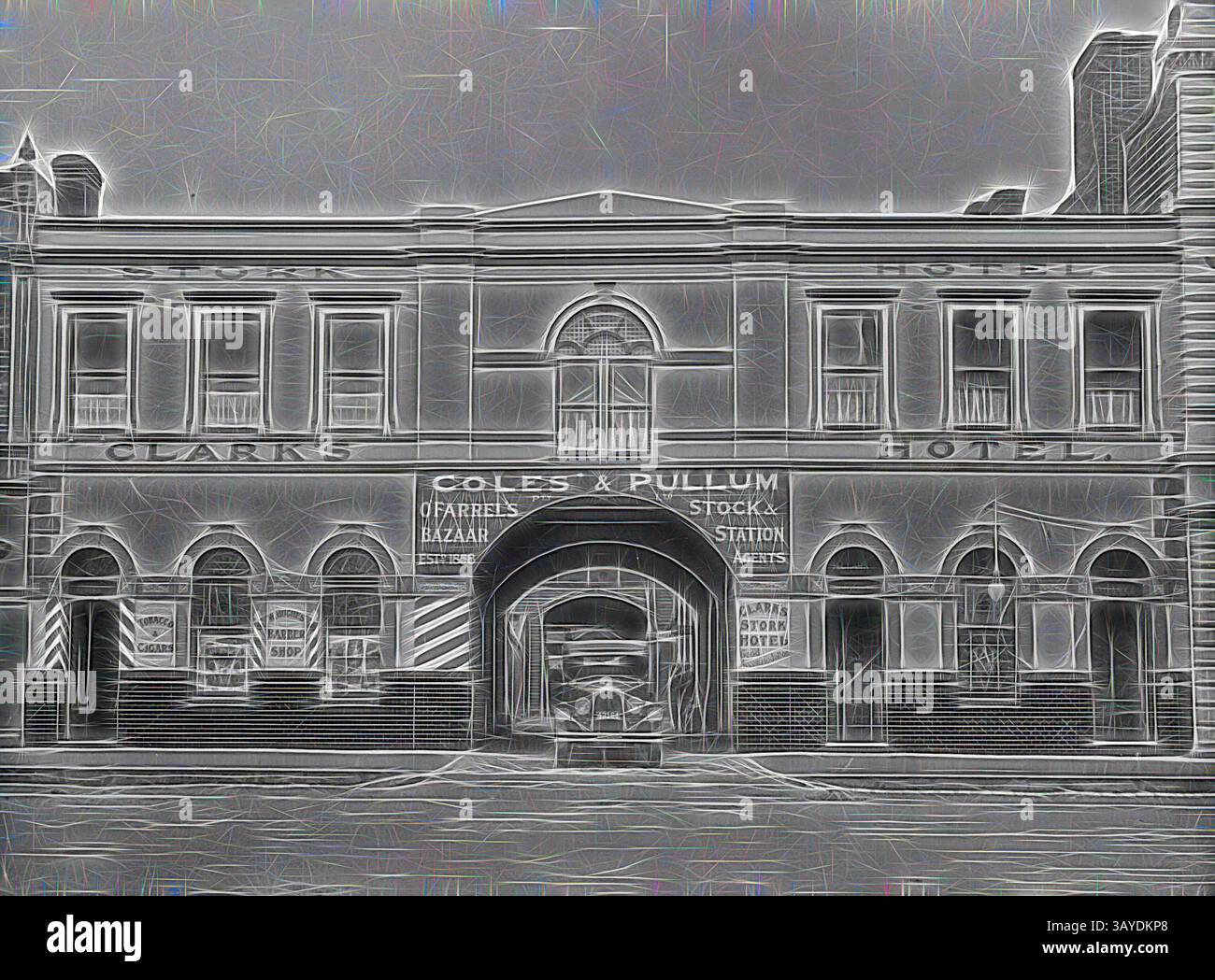 An ornate building features a prominent archway, flanked by signs for ...