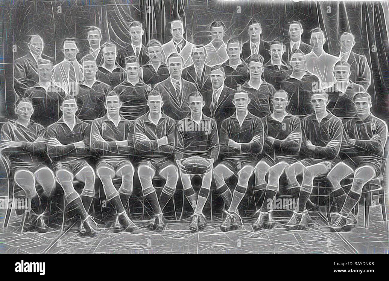 A team of athletes poses together, showcasing their camaraderie and ...