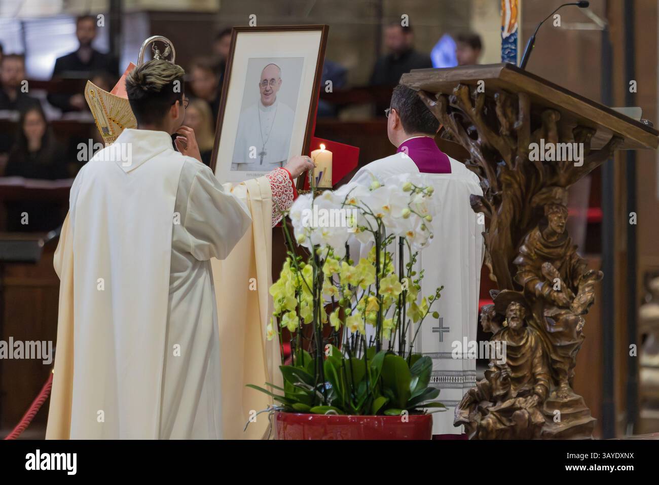 Milan, Italy. 22nd Apr, 2025. Archbishop of Milan Mario Del Pini lights ...