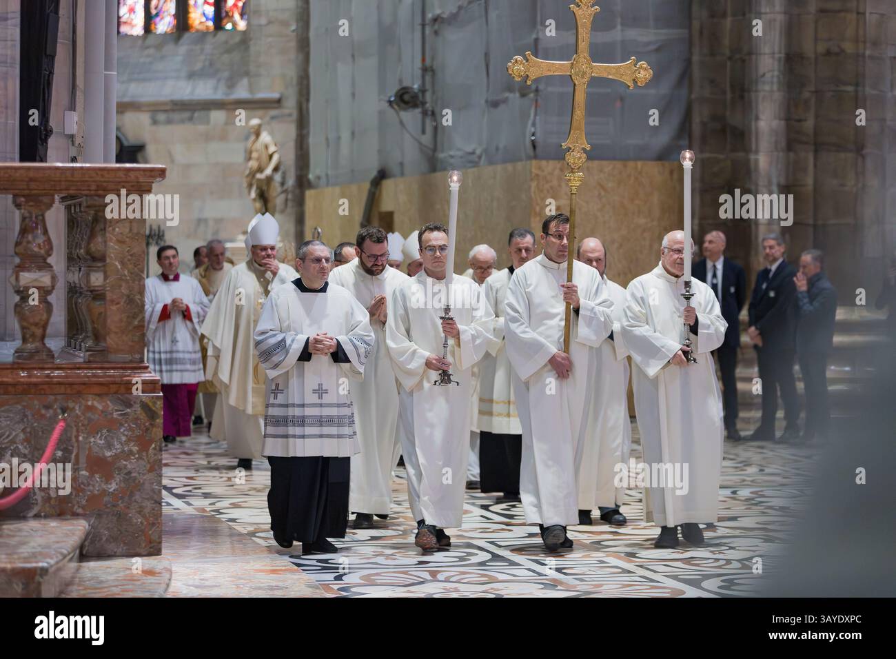 Milan, Italy. 22nd Apr, 2025. some priests present on the altar during ...