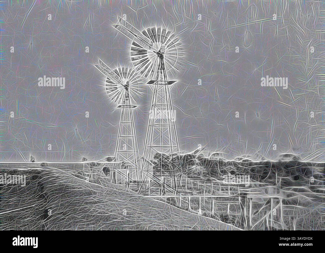 Two towering windmills stand against a backdrop of rolling hills, their ...