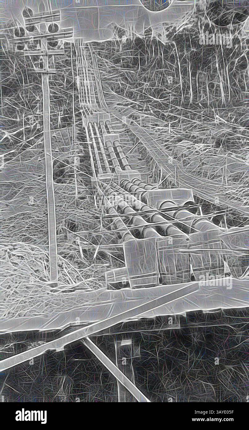 A series of pipes stretches along a winding path, surrounded by ...