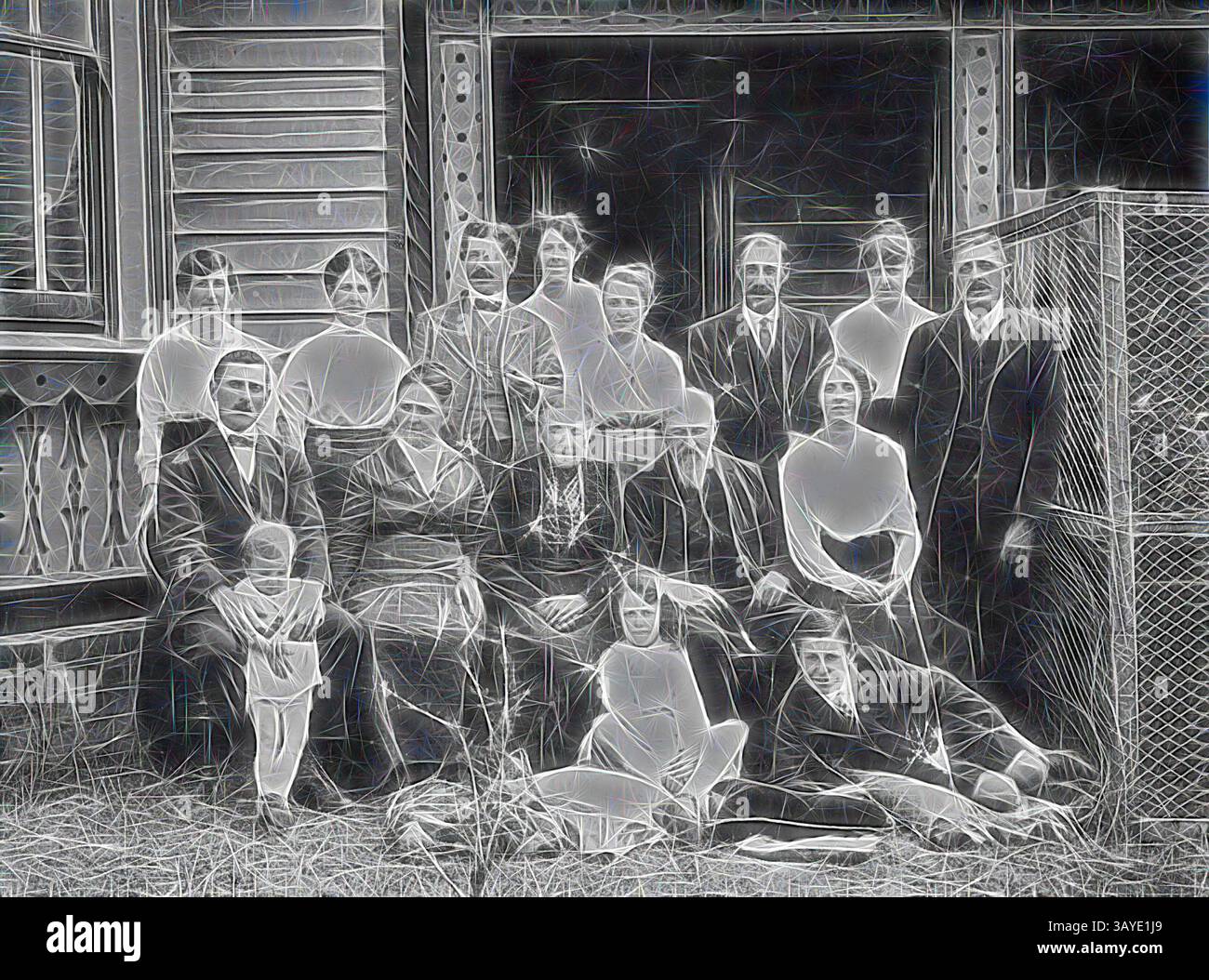 Large group of individuals poses together outside hi-res stock ...