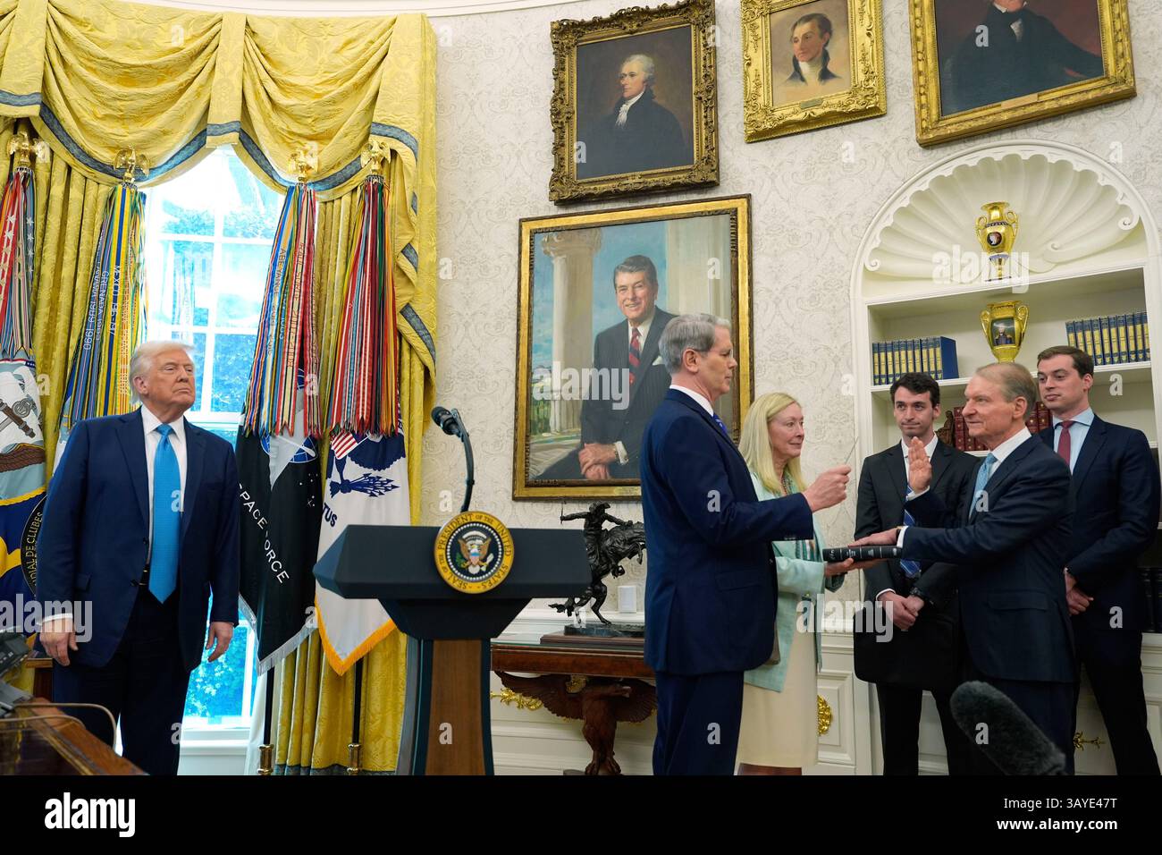 Treasury Secretary Scott Bessent performs a ceremonial swearing in of ...