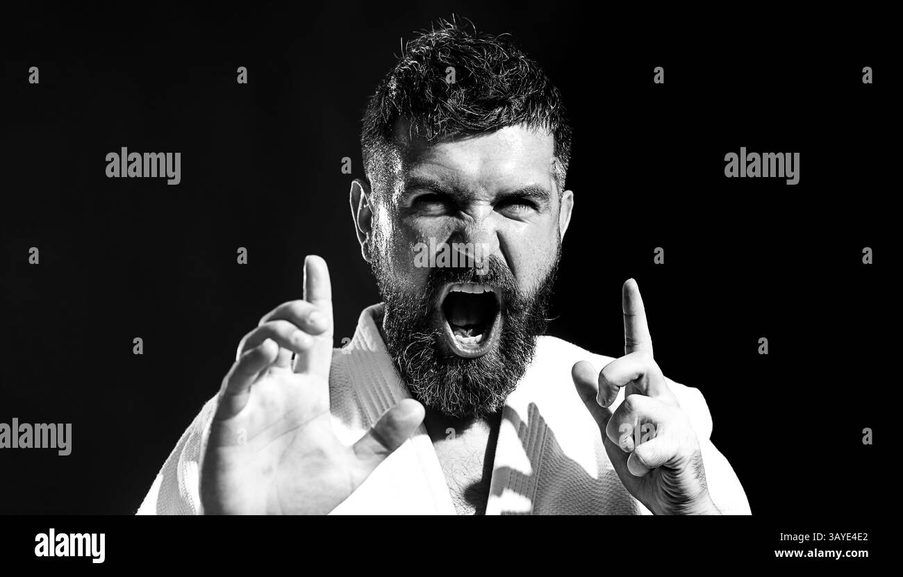 Karate man in kimono ready to fight. Sport and fitness. Strength and ...