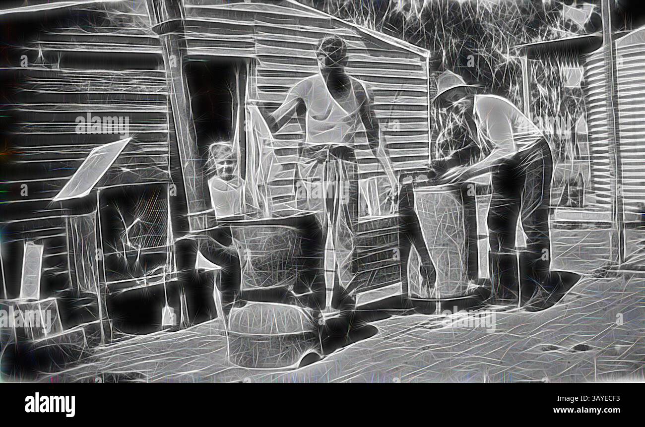 Three individuals are engaged in a task outdoors, surrounded by rustic ...