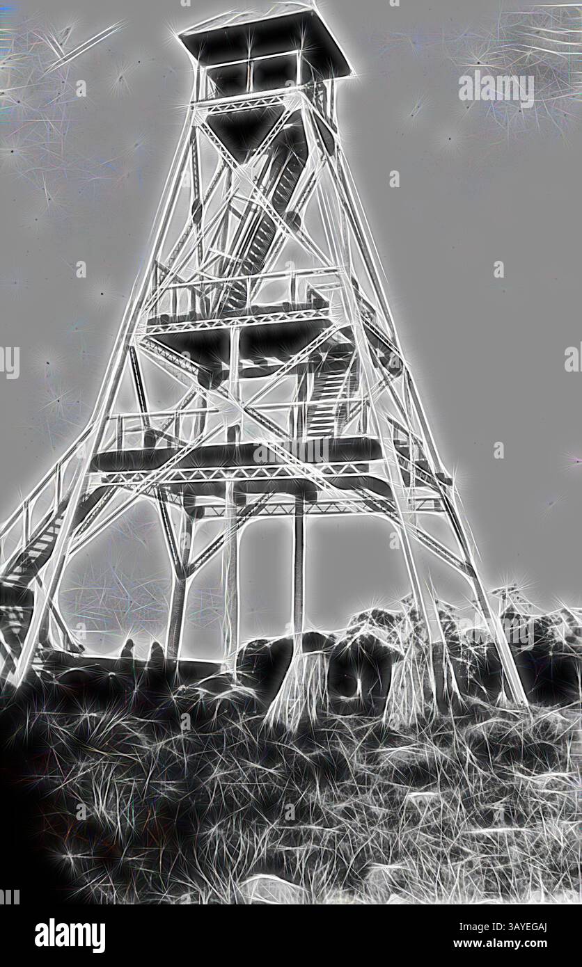 A tall, industrial observation tower stands prominently against a muted ...