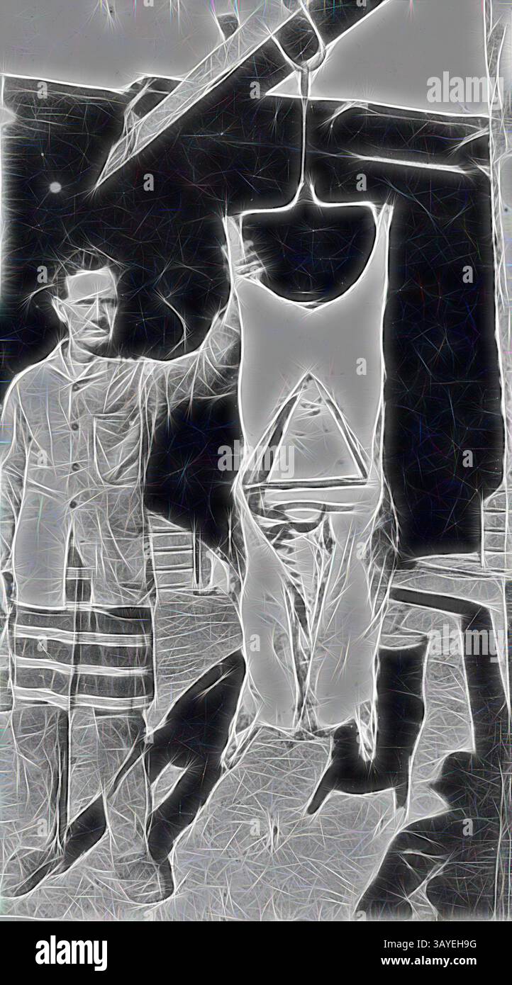 A person stands beside a hanging carcass in a processing facility ...