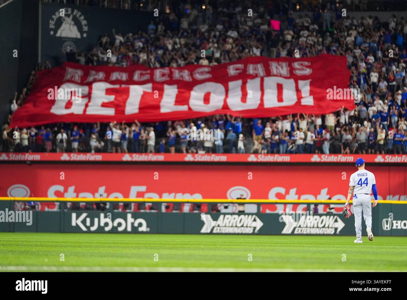 Los Angeles Dodgers center fielder Andy Pages heads to his position ...