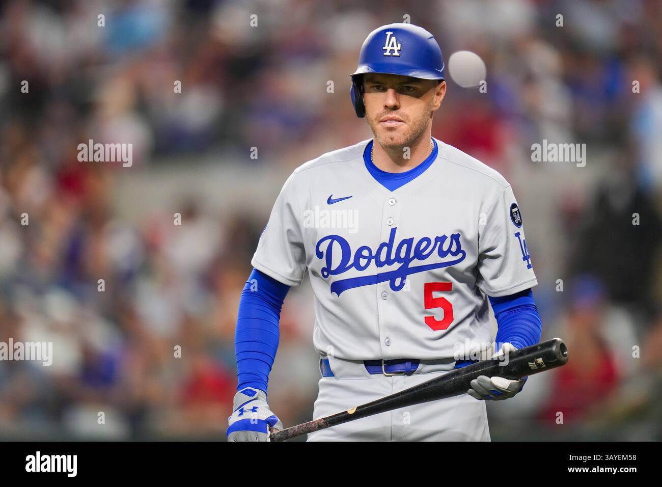 Los Angeles Dodgers' Freddie Freeman heads to the dugout after striking ...