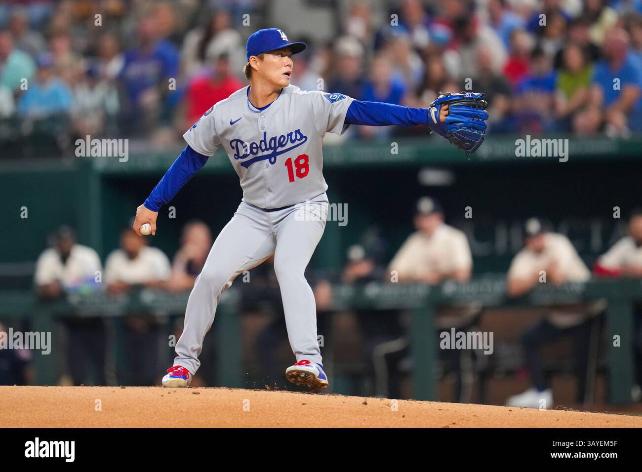 Los Angeles Dodgers starting pitcher Yoshinobu Yamamoto throws a pitch ...