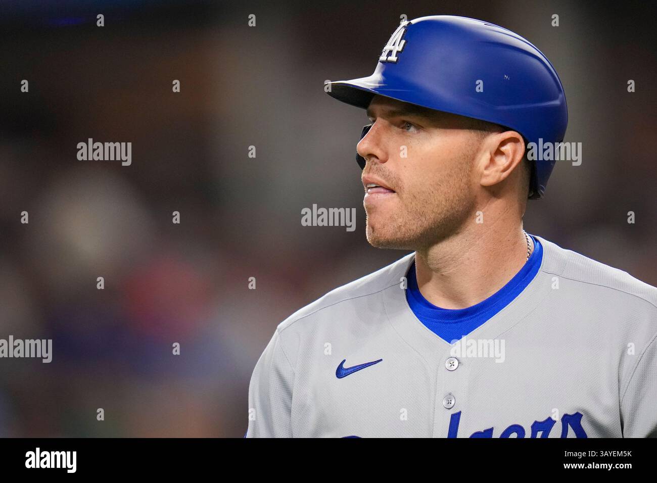 Los Angeles Dodgers' Freddie Freeman heads to the dugout after striking ...