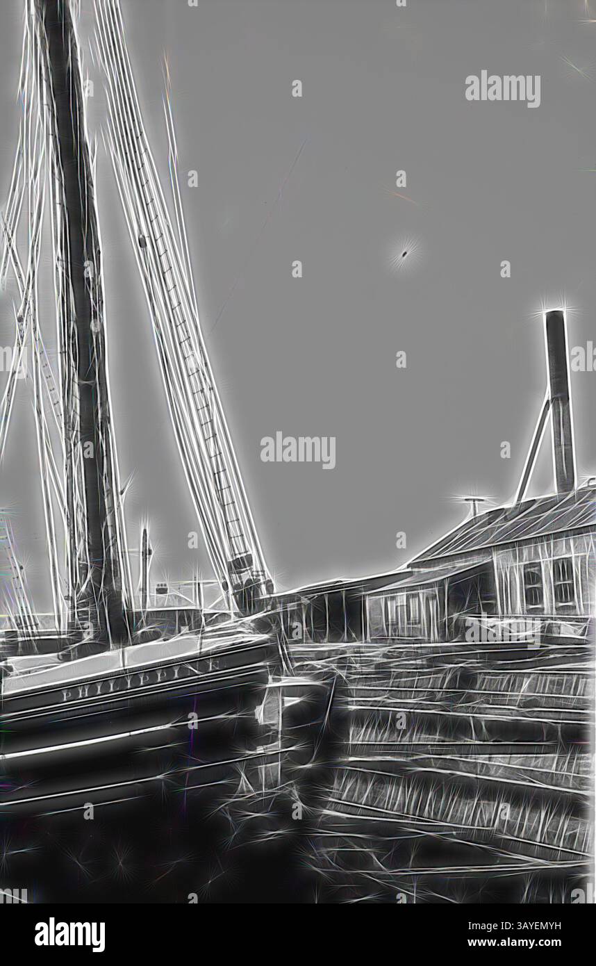 A vintage-style sailboat rests alongside a dock, with a prominent ...