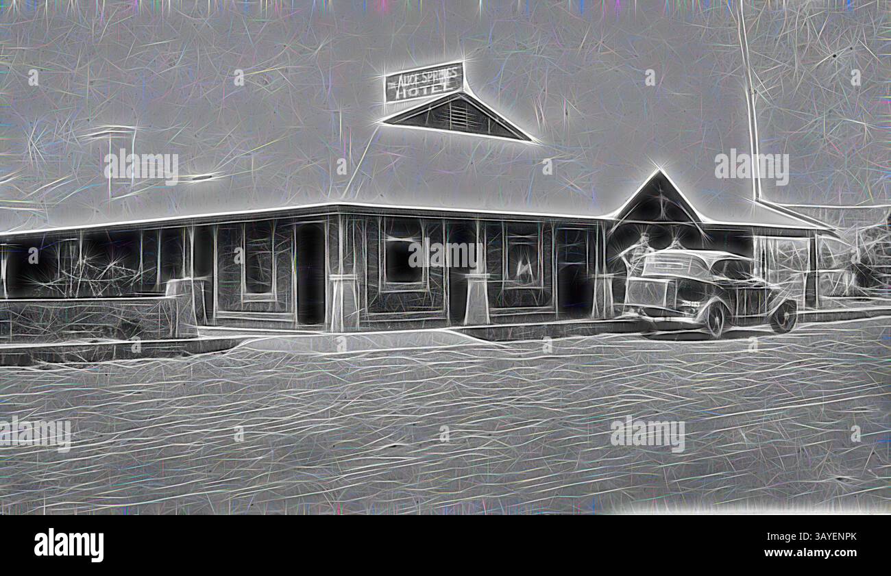 A vintage hotel building features a classic sign, with an old car ...