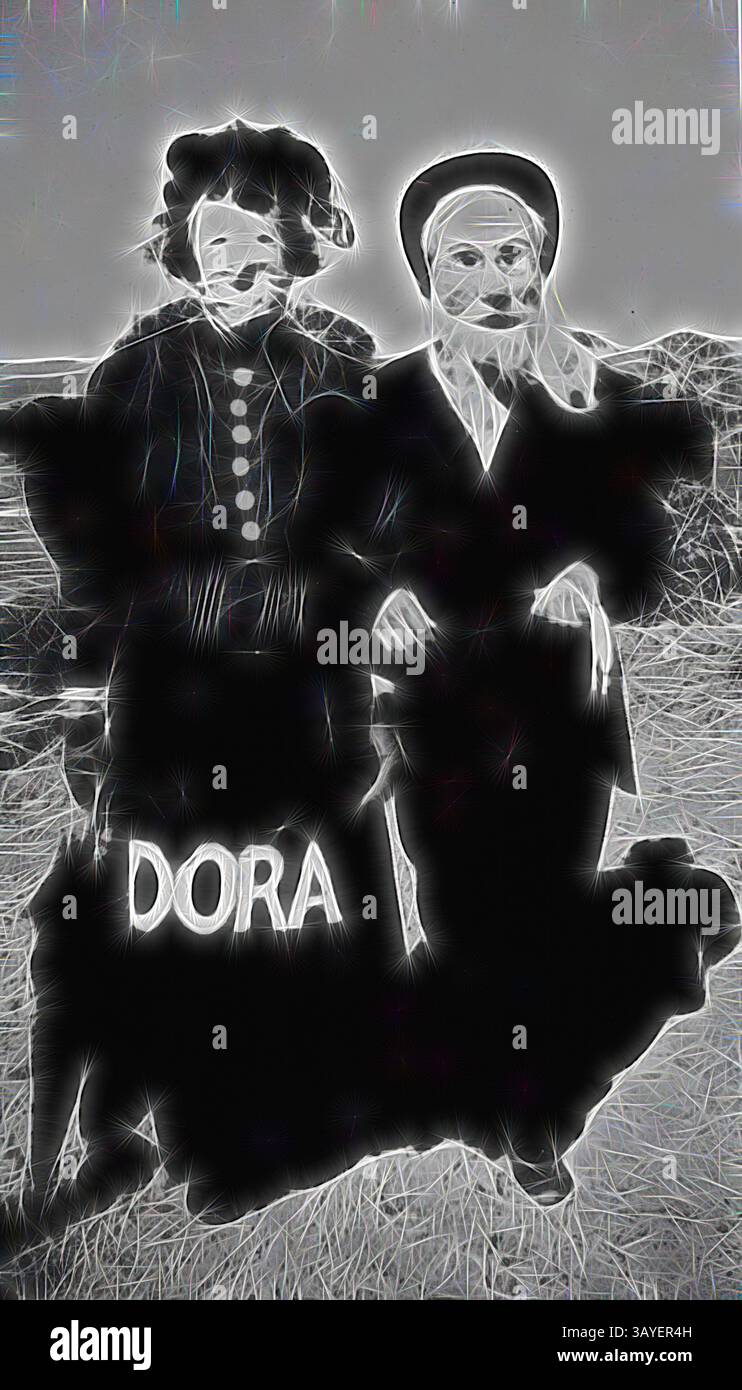 Two individuals stand together in a rural setting, with one wearing a ...