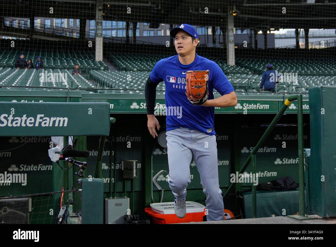 Los Angeles Dodgers' Shohei Ohtani (17) warms before a baseball game ...