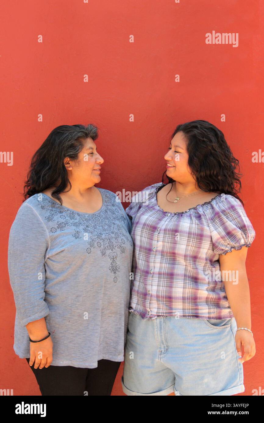 A 50-year-old divorced single mother and her 30-year-old dark-skinned ...