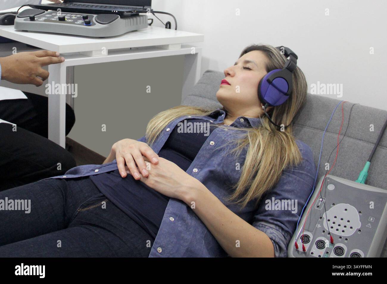 Auditory evoked potentials, a neurophysiological test performed on a 30 ...