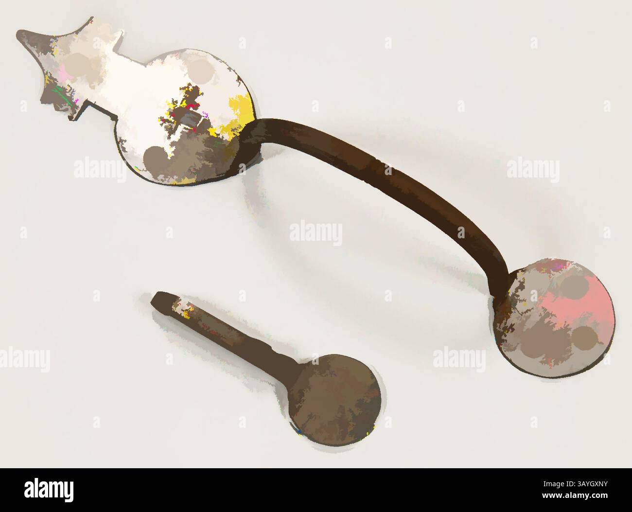A decorative metal hook with a whimsical design, featuring a star motif ...