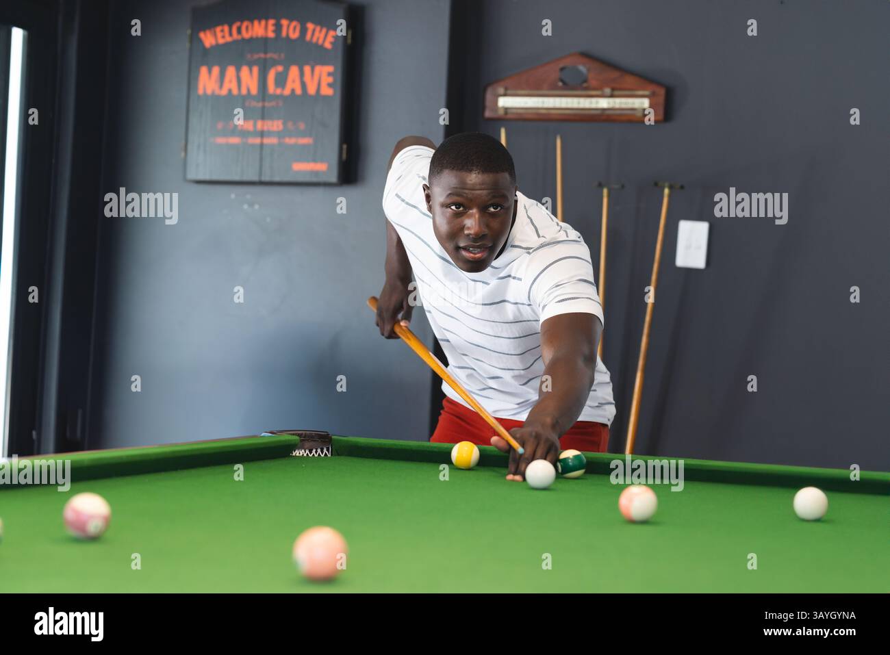 Leaning on shooting stick hi-res stock photography and images - Alamy
