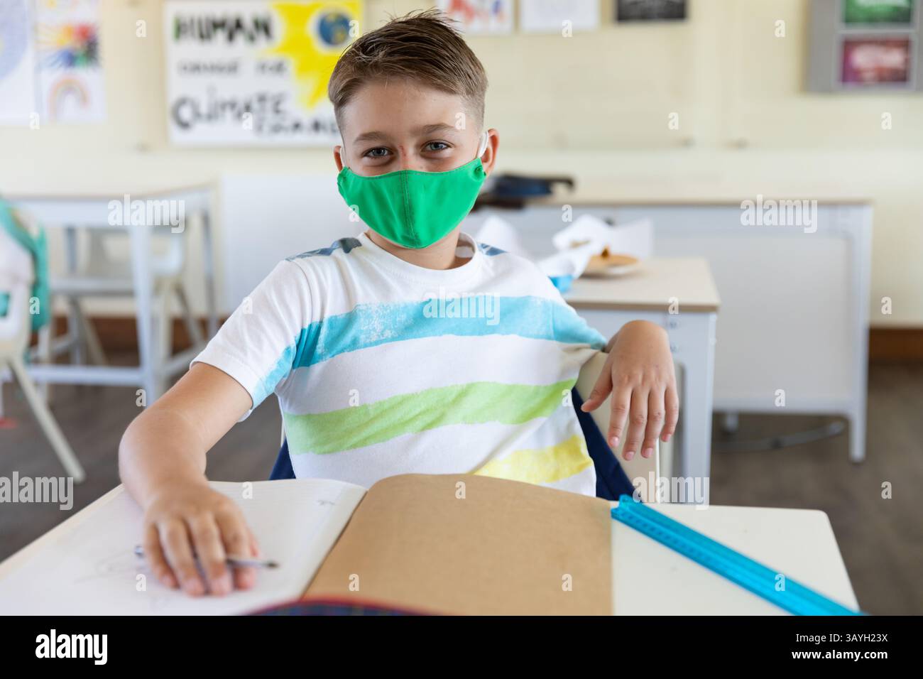 Schoolboy wearing green cloth hi-res stock photography and images - Alamy