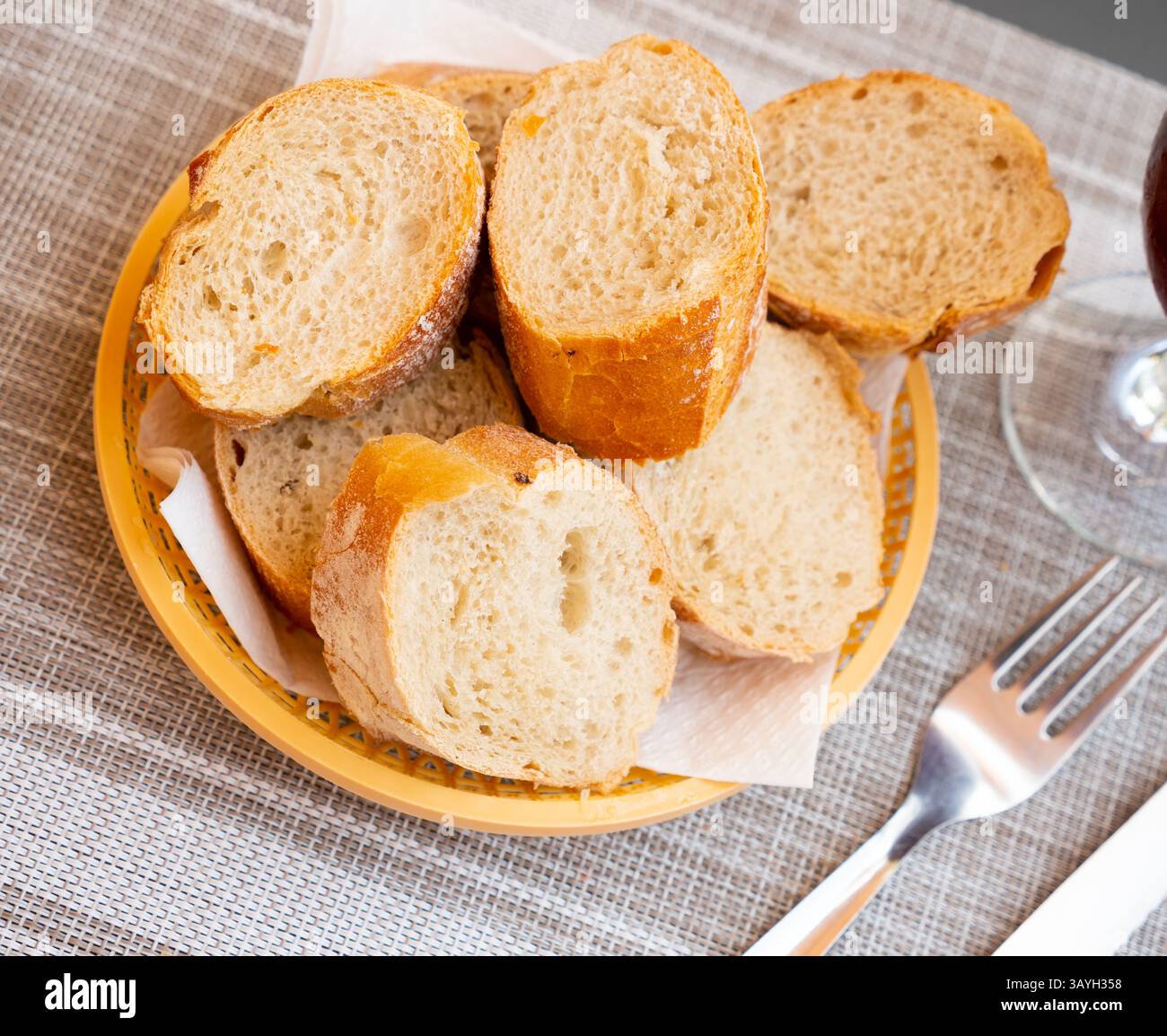 Served bread in wicker plate Stock Photo - Alamy