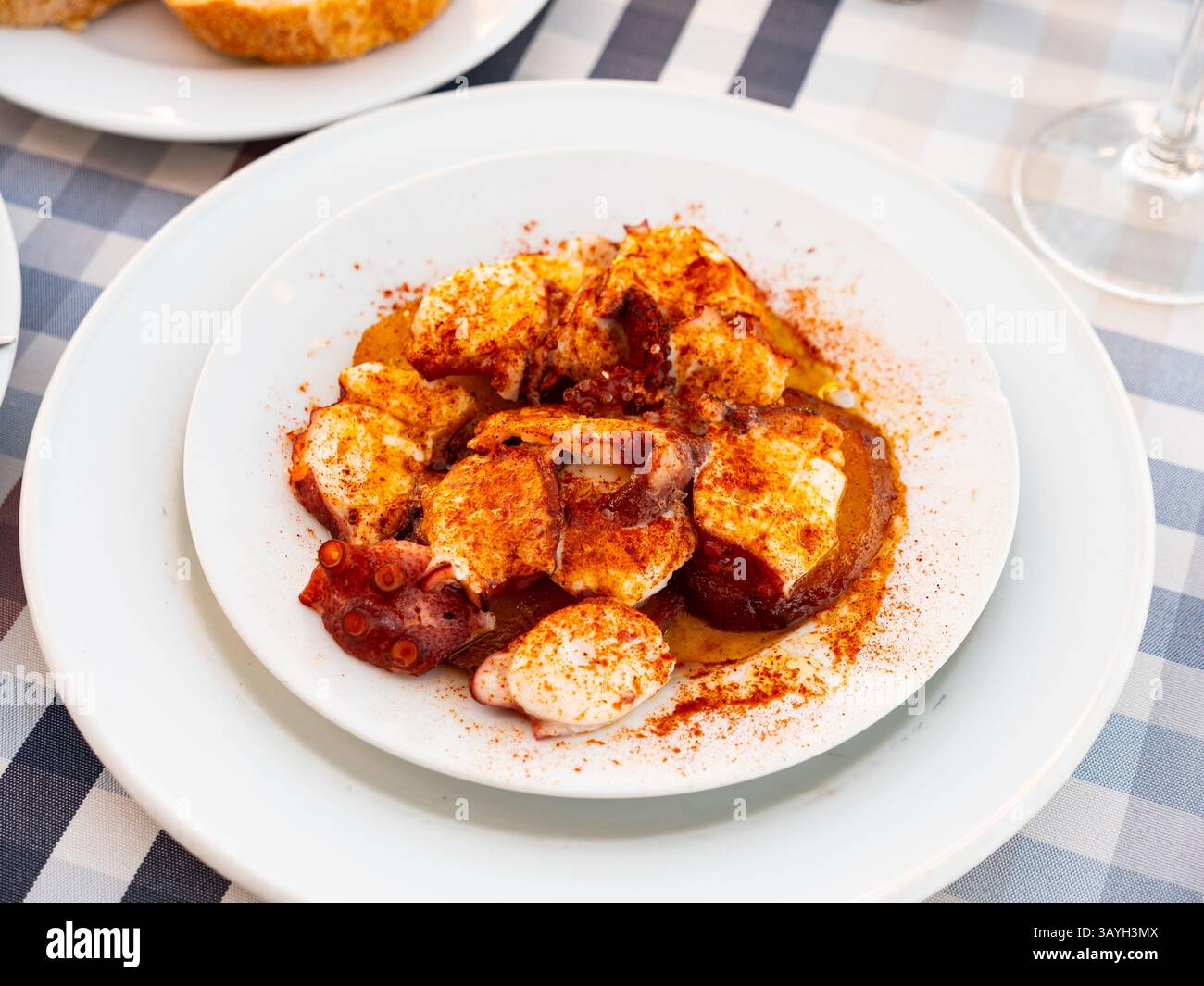 Galician style octopus served hi-res stock photography and images - Alamy