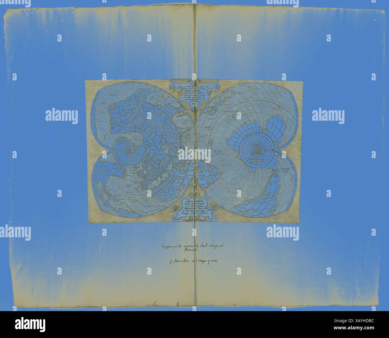 A vintage map displays the world in two hemispheres, showcasing ...