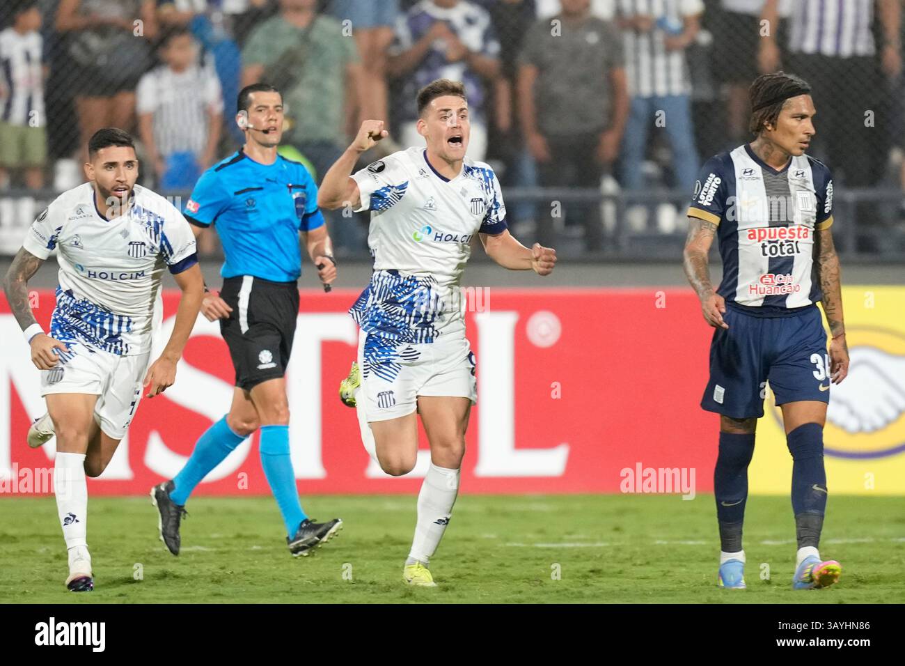 Federico Girotti of Argentina's Talleres, center, celebrates after ...