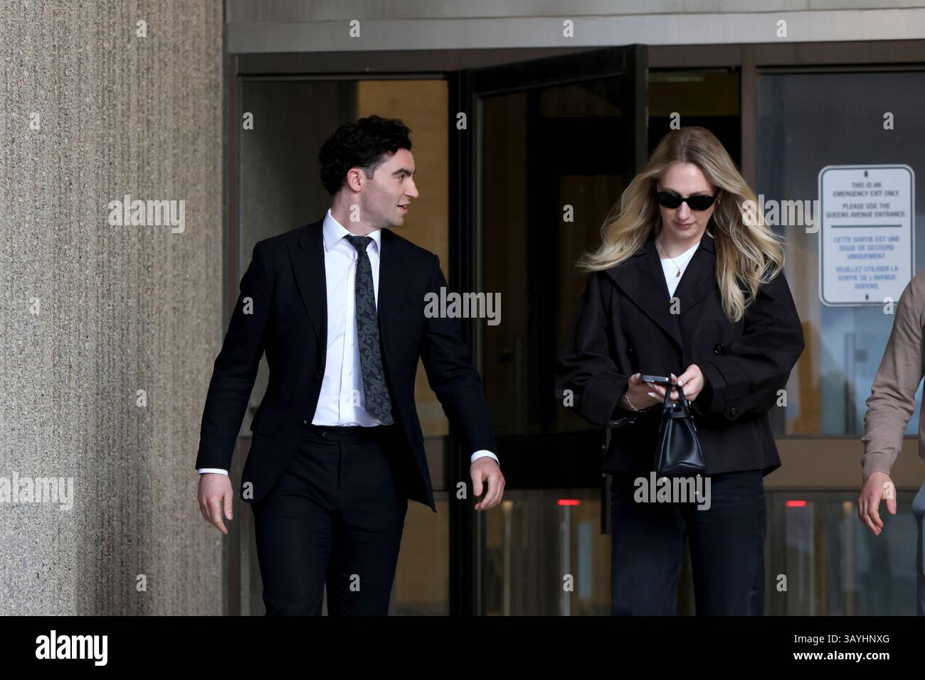 Dillon Dube leaves the London Courthouse in London, Ont., Tuesday ...