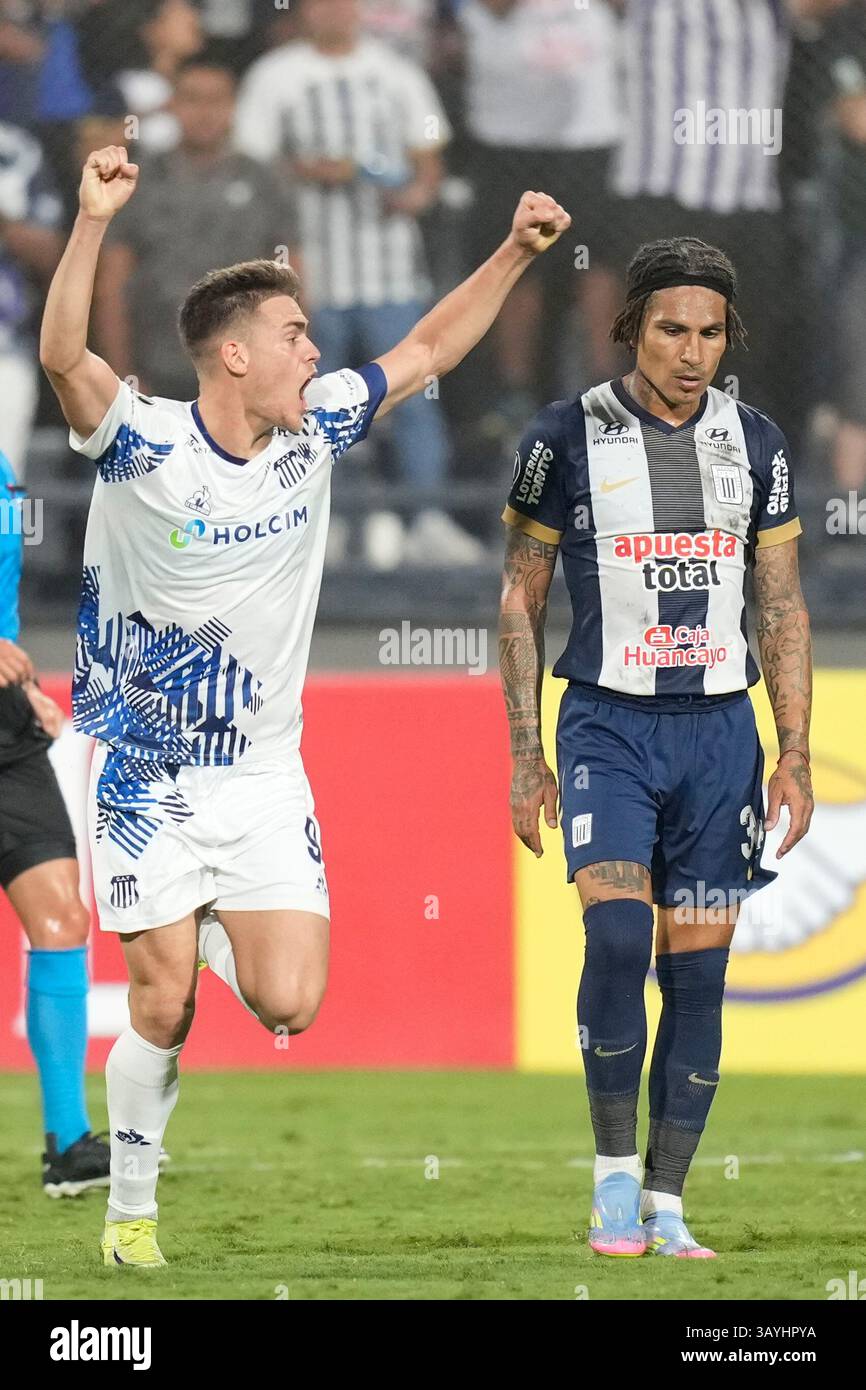 Federico Girotti of Argentina's Talleres, left, celebrates after ...